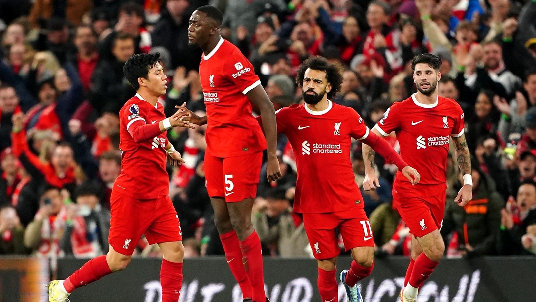 Mohamed Salah on target as Arsenal retain top spot after draw at ...